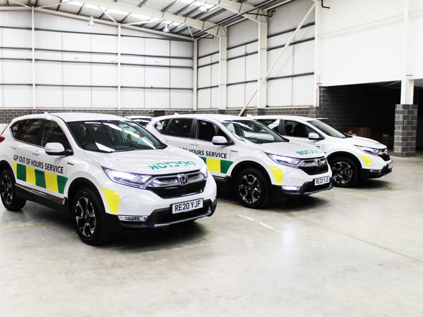 Installing signage for a new fleet of NHS service cars! - Stone Create Installing signage for a new fleet of NHS service cars! - Stone Create